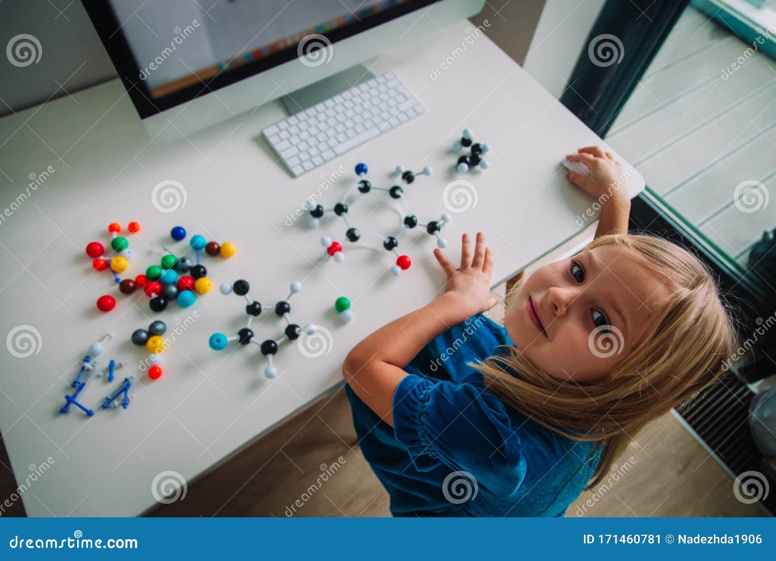 Little Girl Making Model of a Molecule with Computer Program, Learning ...