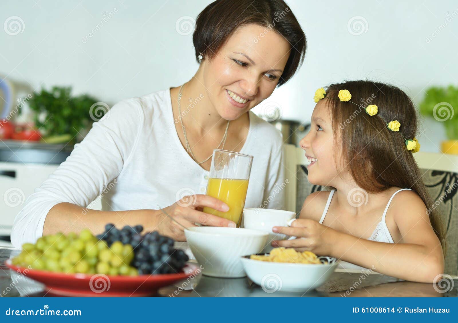 Little Girl with Mother Eating Stock Photo - Image of meal, girl: 61008614