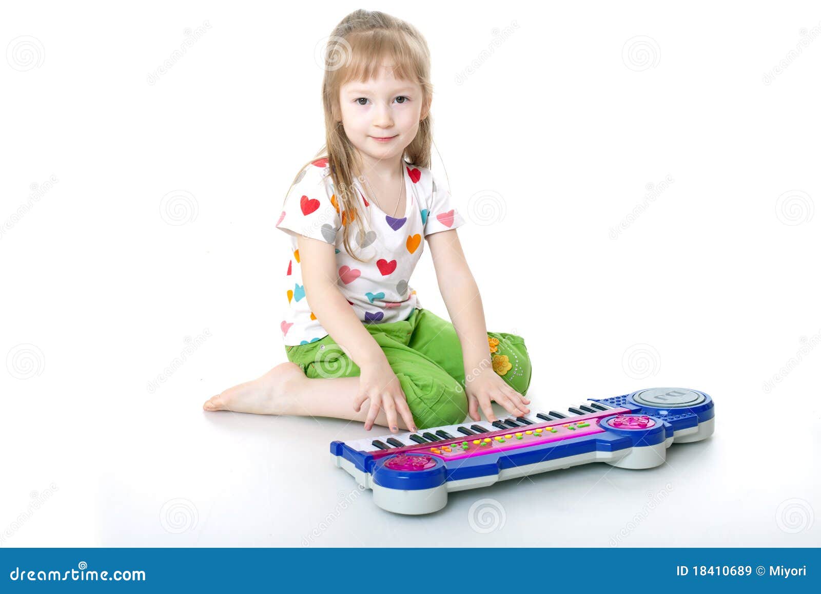 The Little Girl with a Musical Toy Stock Image - Image of musical ...