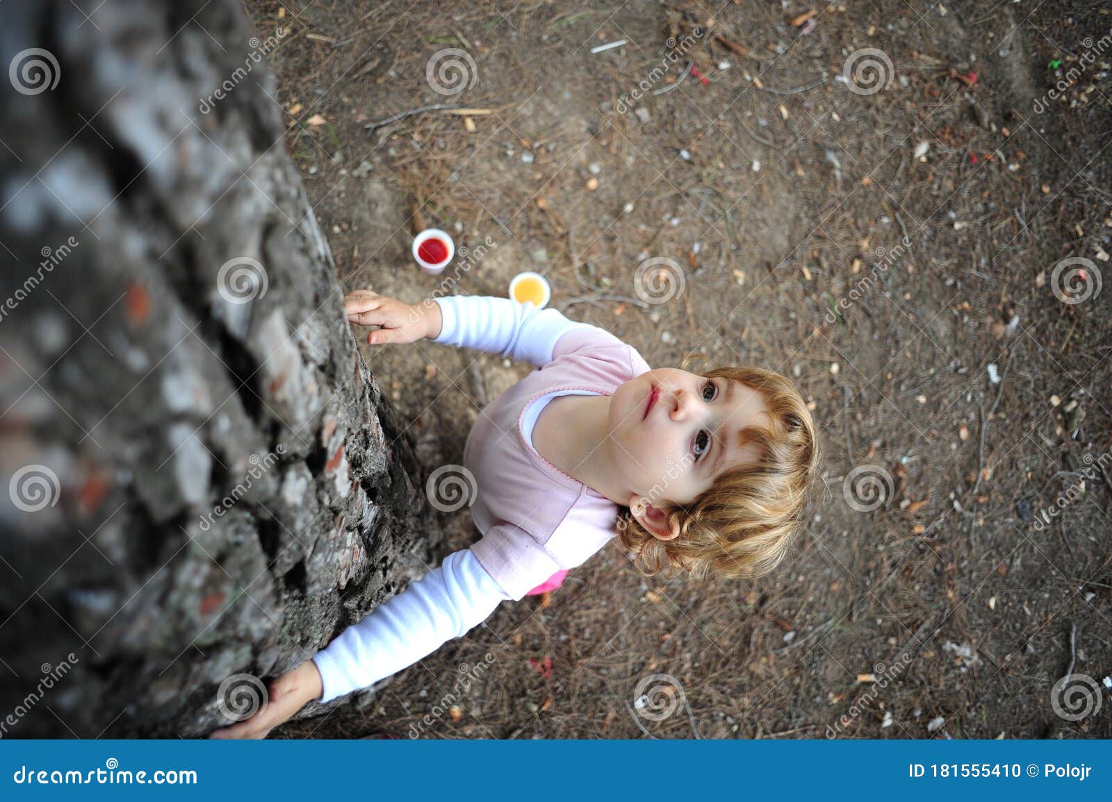 Little girl next to tree stock photo. Image of outside - 181555410