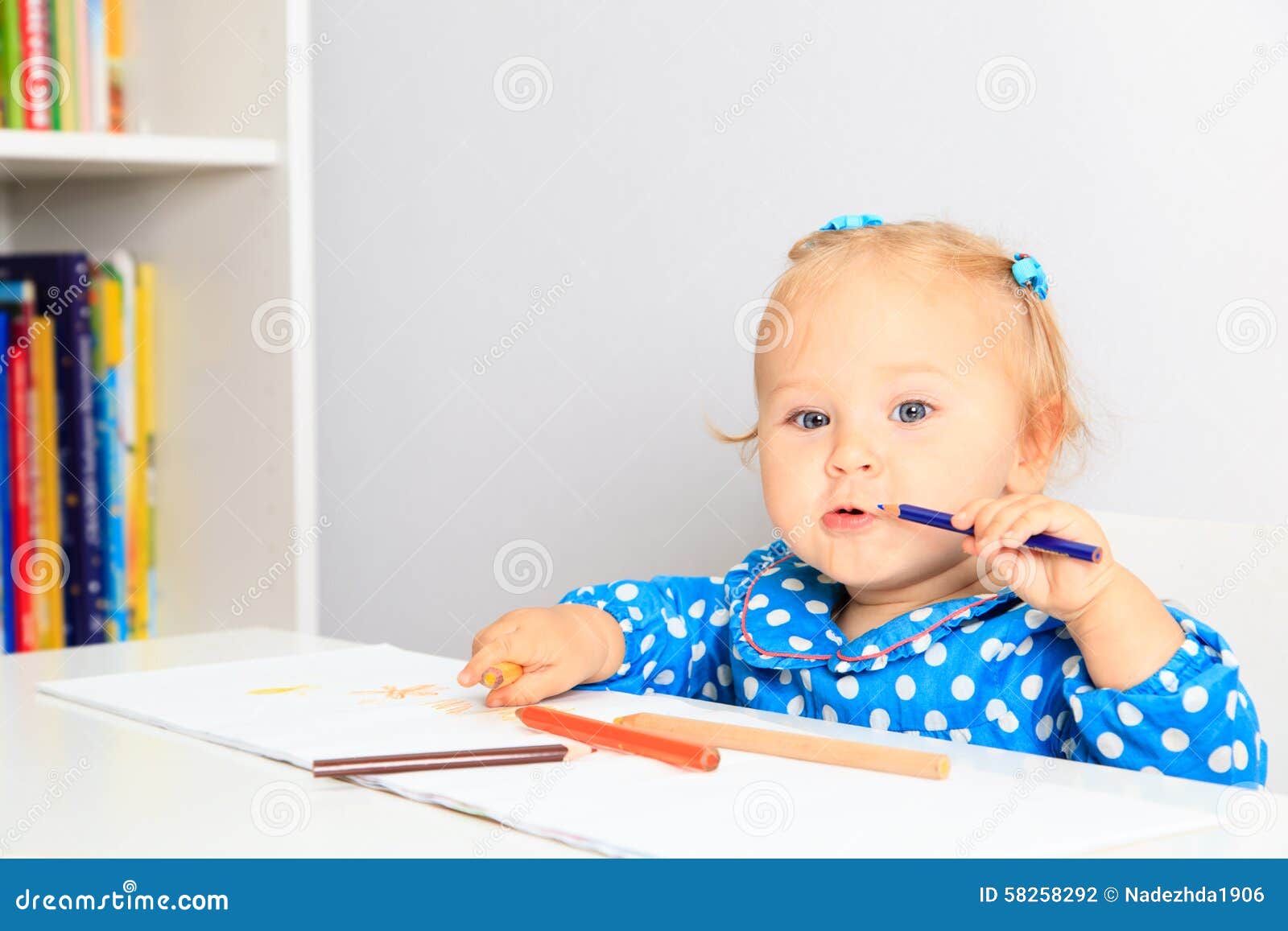 Little girl with pencils stock photo. Image of person - 58258292