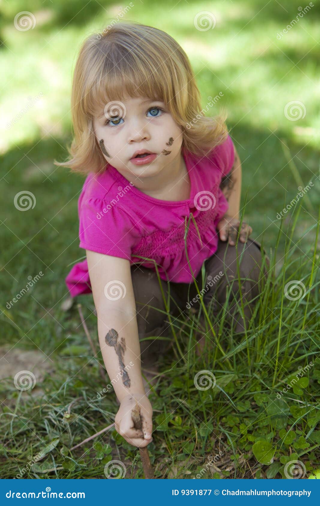 Little Girl In Pink With Muddy Face Picture. Image: 9391877