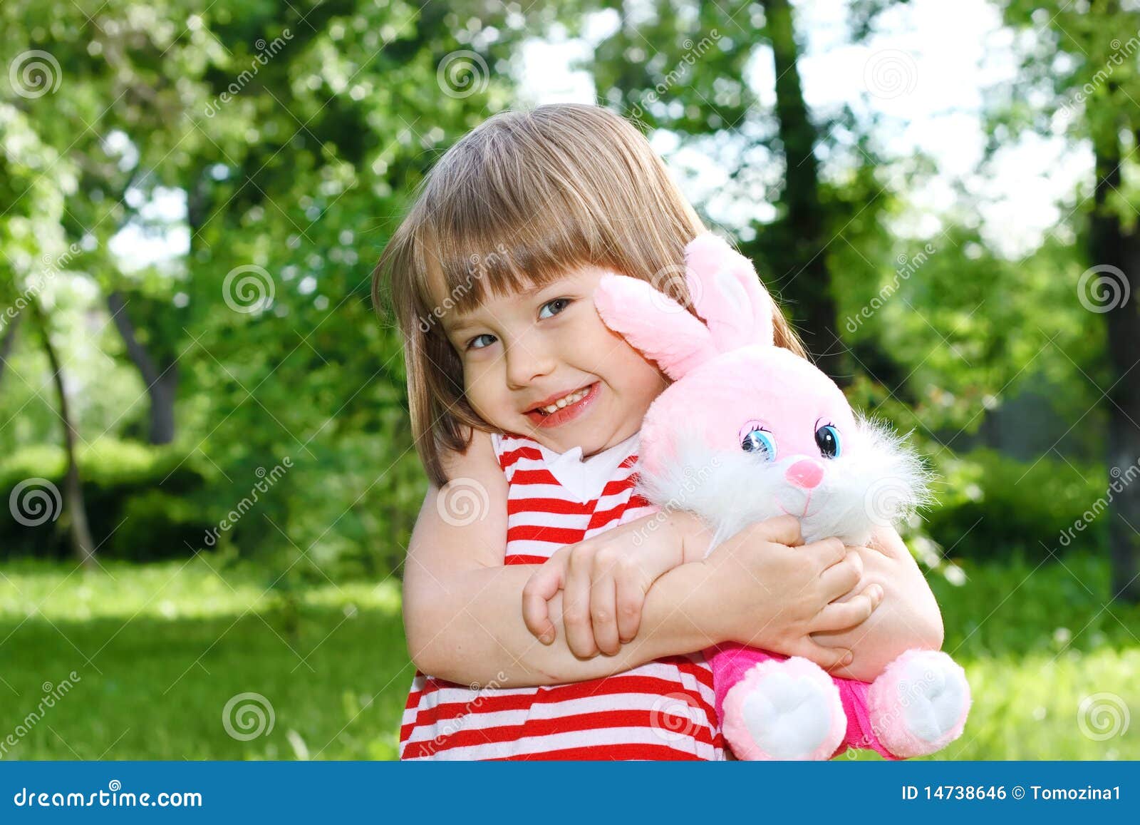 Little Girl with Pink Rabbit Stock Photo - Image of casual, child: 14738646