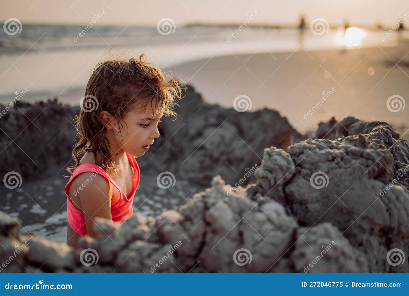 Little Girl Playing on the Beach, Digging Hole in Sand. Stock Image ...