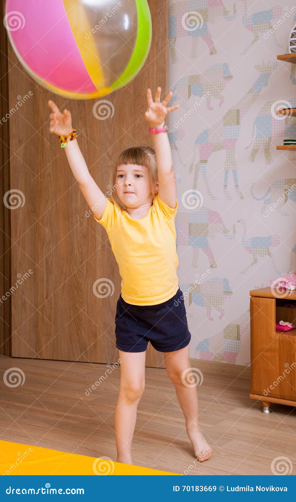 Little Girl Playing with a Big Ball Stock Image - Image of playing ...