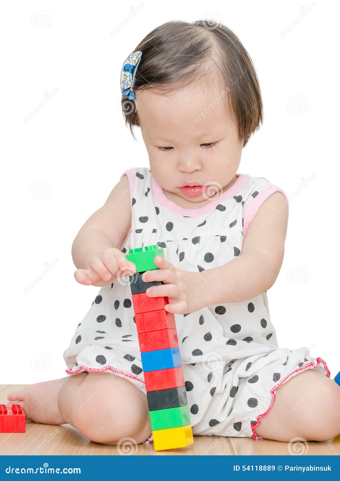 Little girl playing blocks stock image. Image of game - 54118889