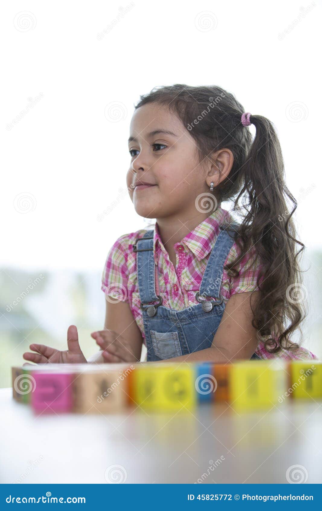 Little Girl Playing with Blocks at Home Stock Photo - Image of latin ...