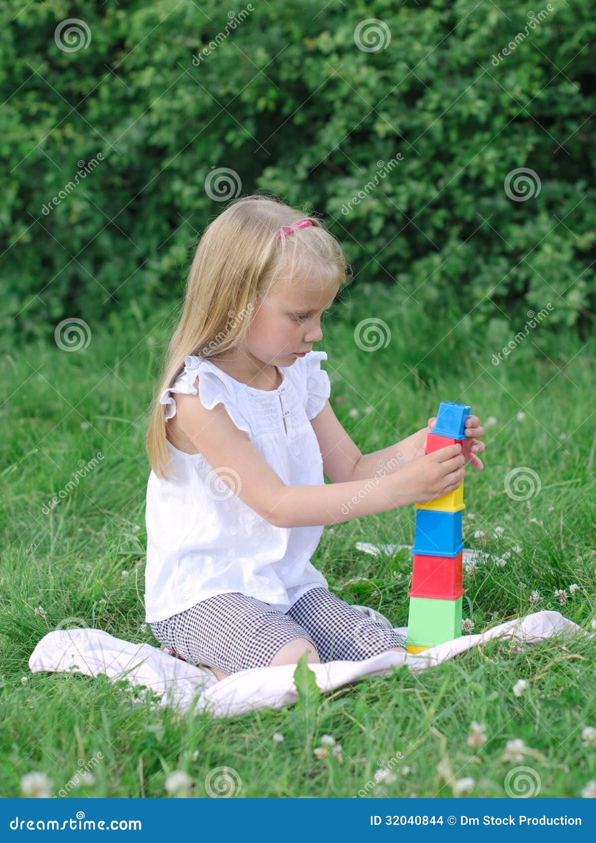Little girl playing blocks stock photo. Image of learn - 32040844