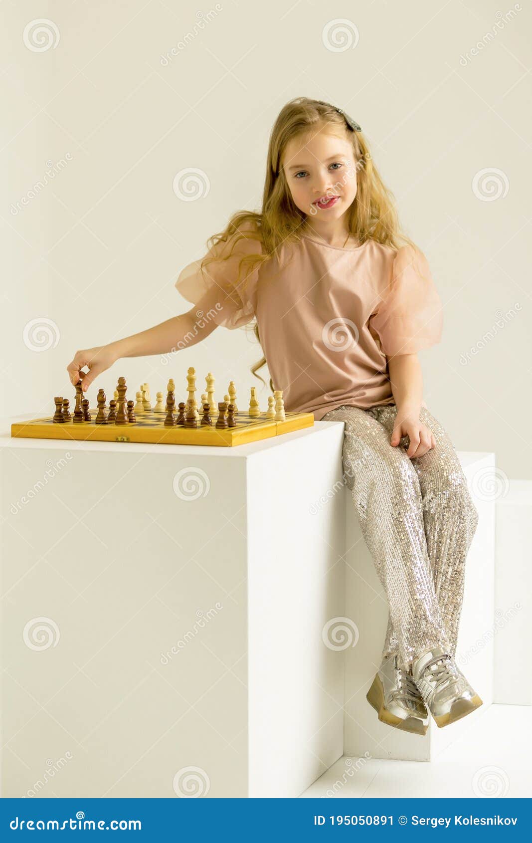 Little Girl Playing Chess.Creative Education of a Child. Stock Image ...