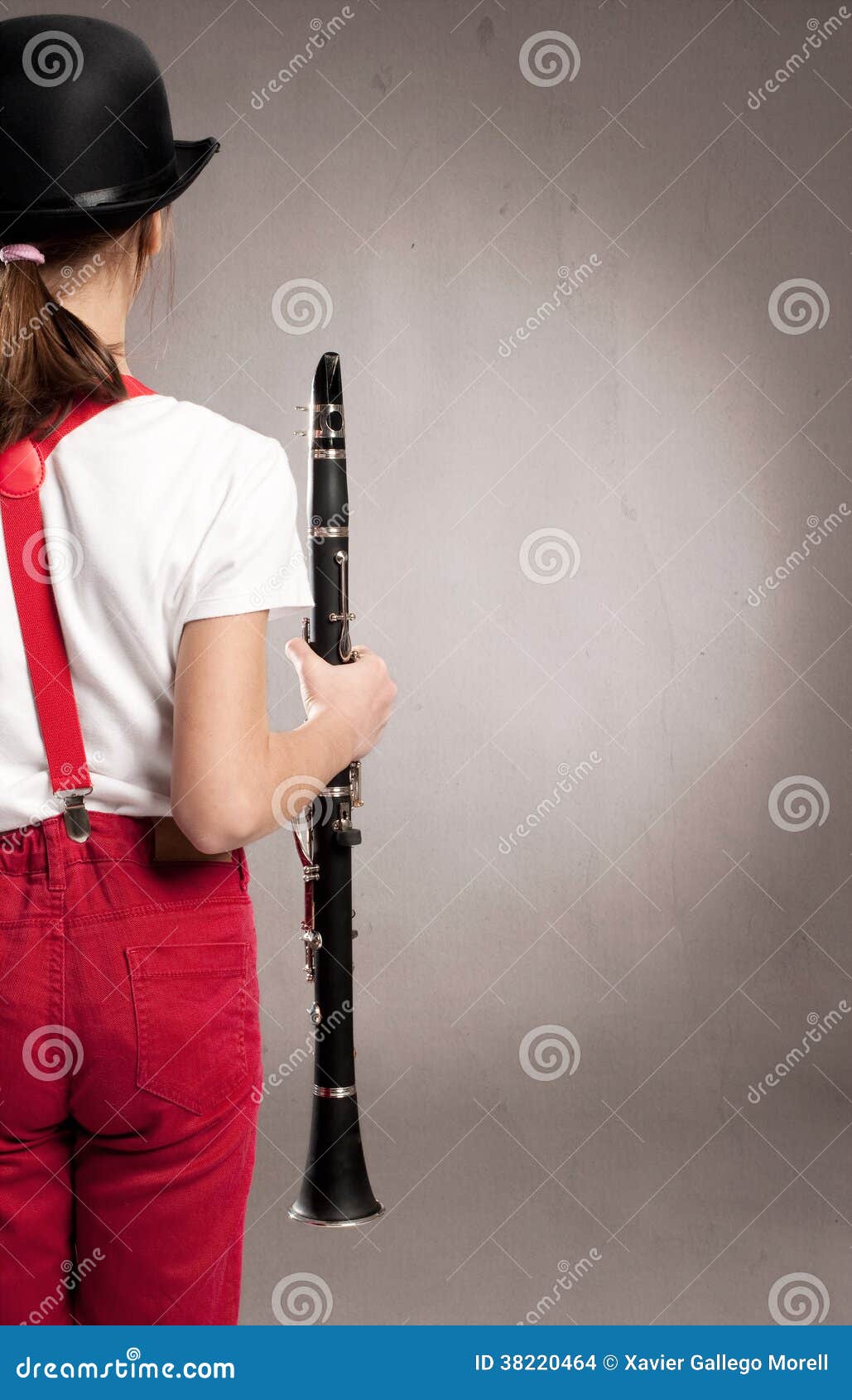 Little Girl Playing Clarinet Stock Photo - Image of play, grey: 38220464