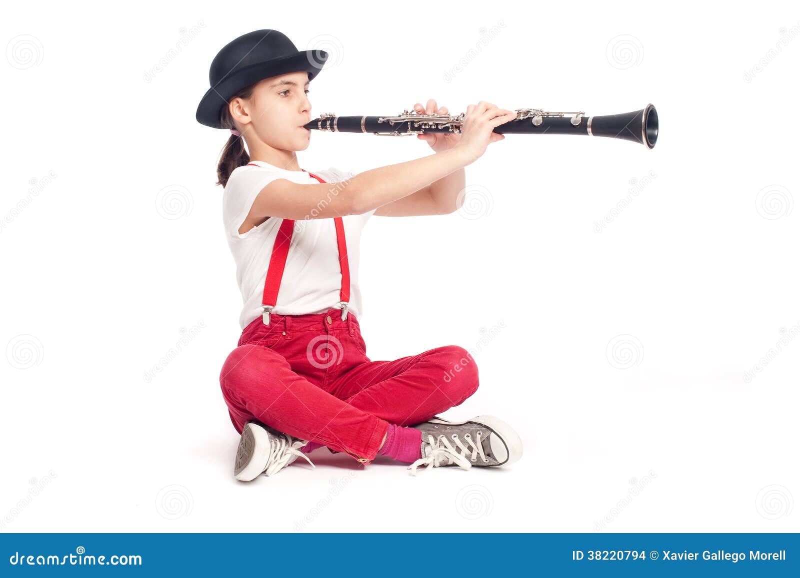 Little Girl Playing Clarinet Stock Photo - Image of portrait, cute ...