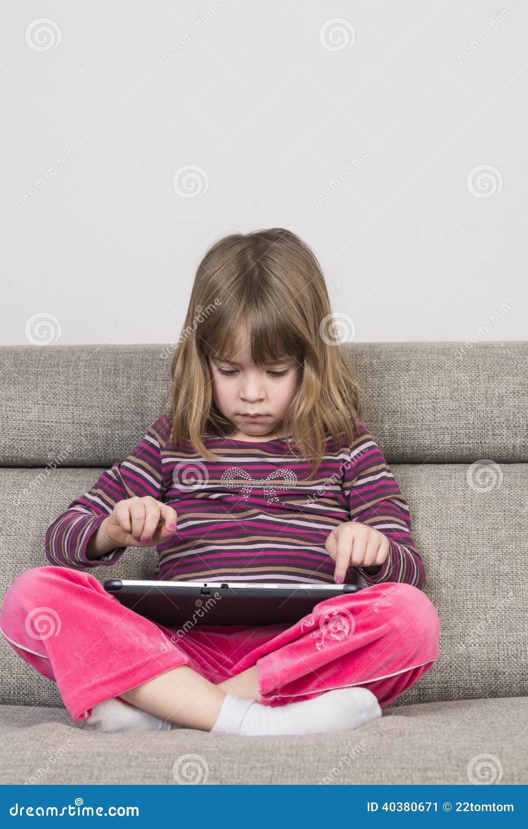 Little Girl Playing with a Digital Tablet Stock Image - Image of ...