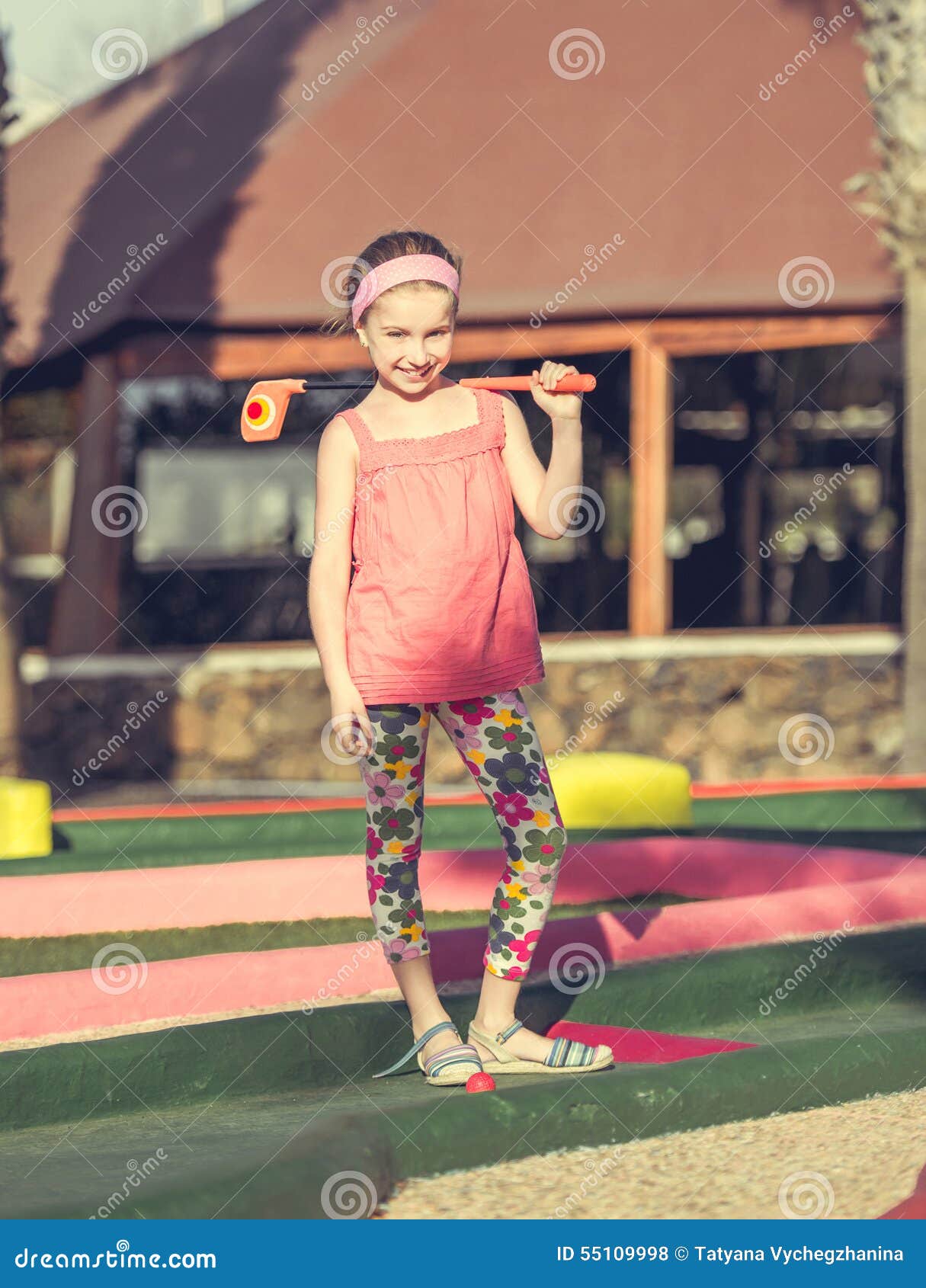 Little girl playing golf stock photo. Image of family - 55109998