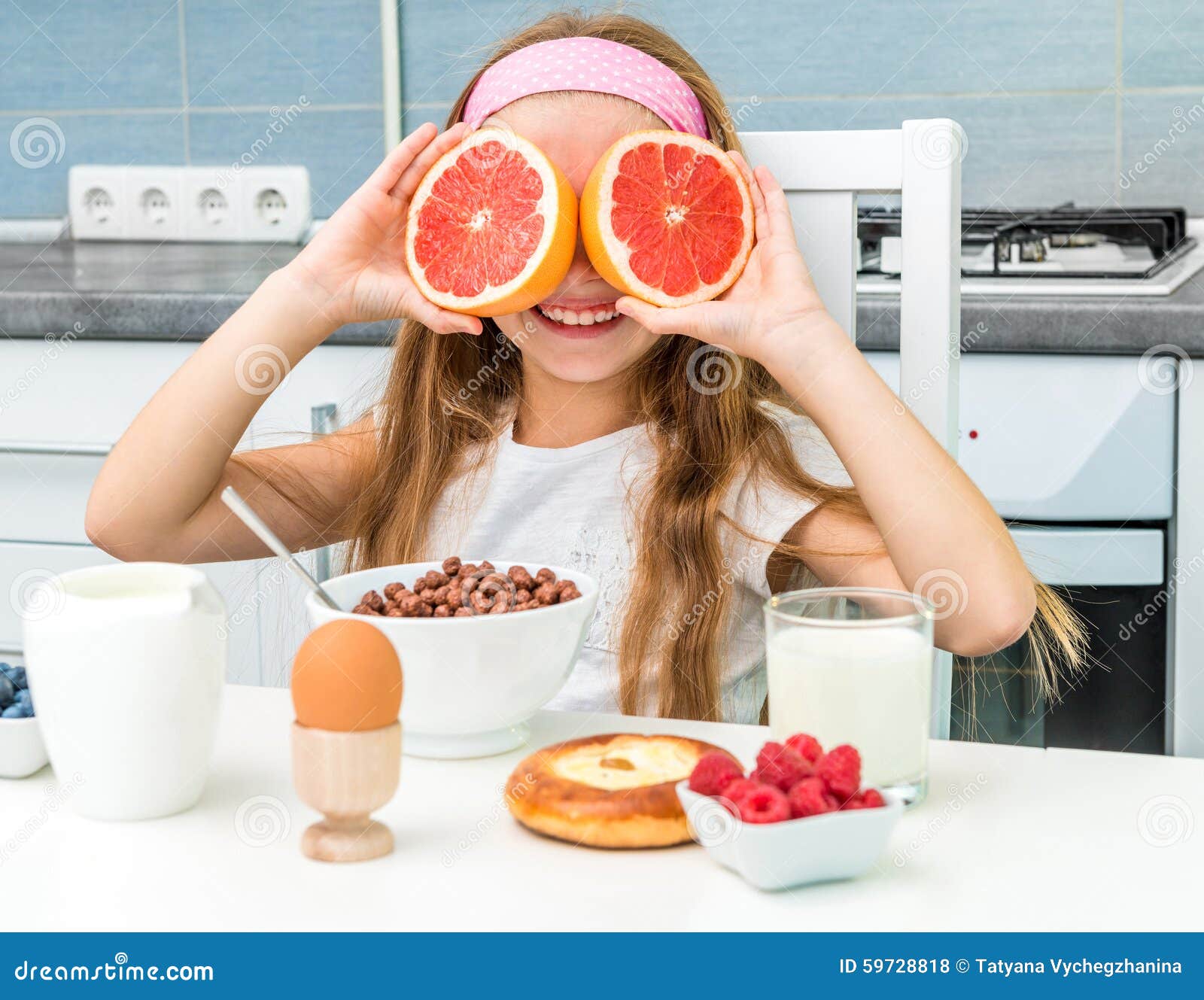 Little Girl Playing Grapefruit Stock Photo - Image of berry, nutritious ...