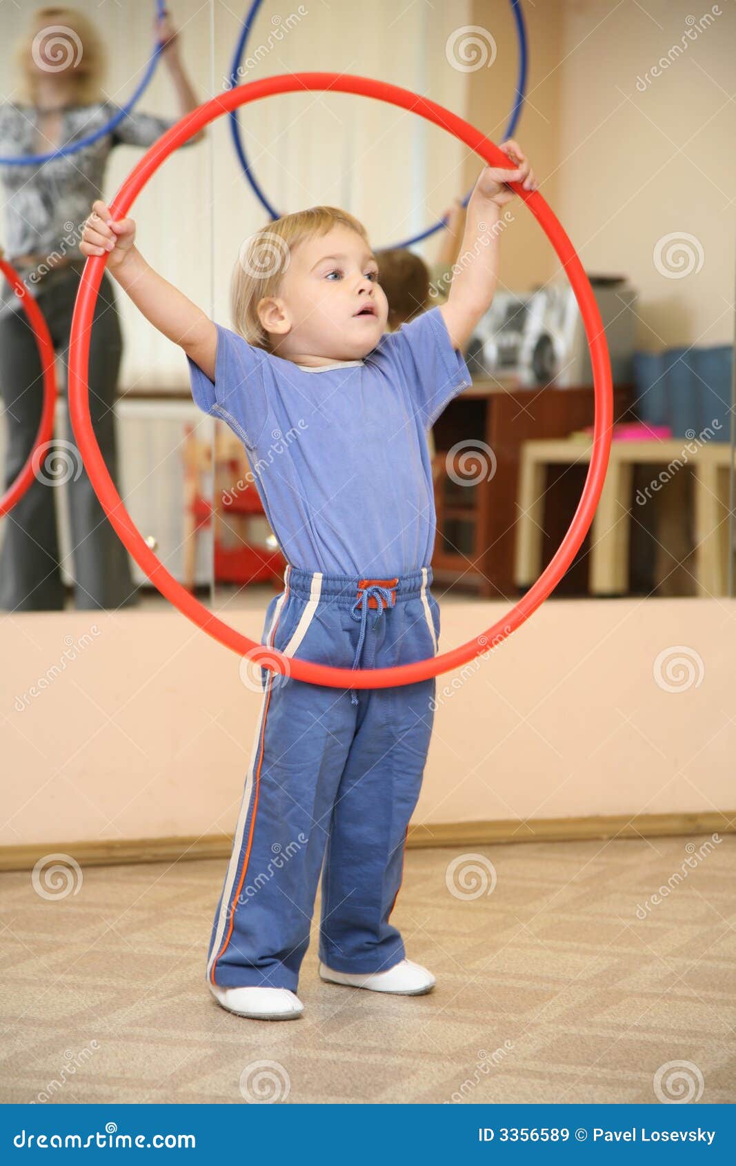 Little Girl Playing with Hoop Stock Image - Image of turn, girl: 3356589