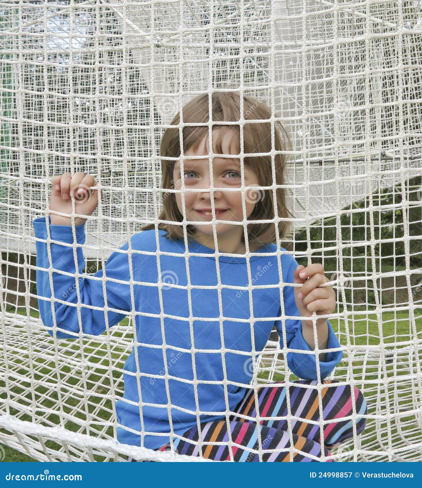 Little Girl Playing in a Net Stock Image - Image of safety, healthy ...