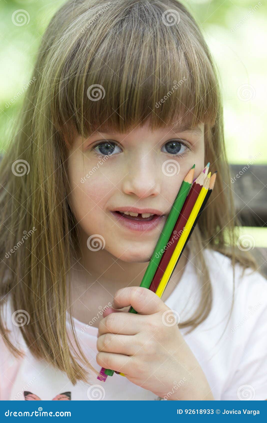 Little Girl Playing Outside and Holding Crayons in Hand Stock Image ... Little Girl Playing Outside and Holding Crayons in Hand Stock Image ...