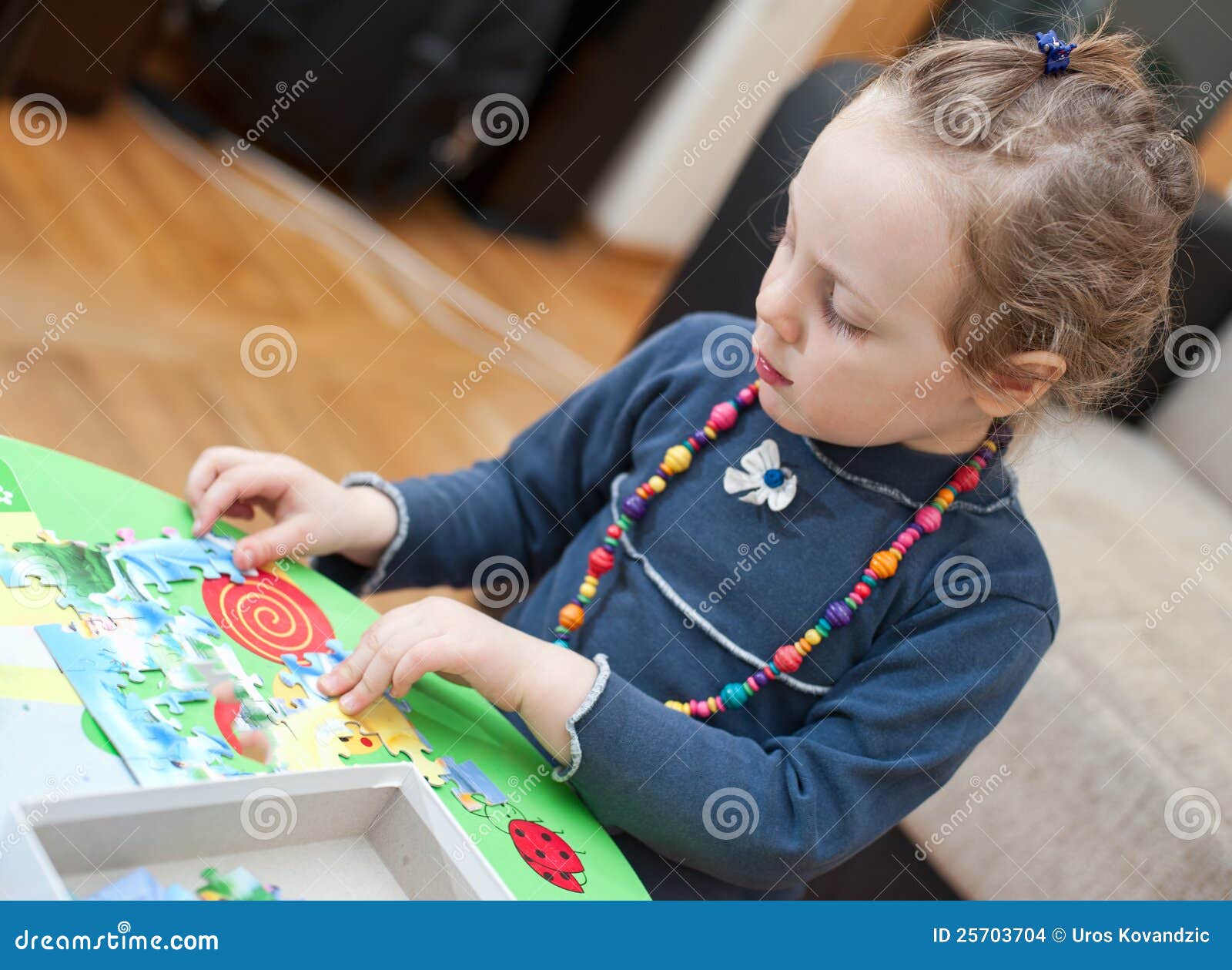 Little Girl Playing Puzzle Game Stock Photo - Image of children ...