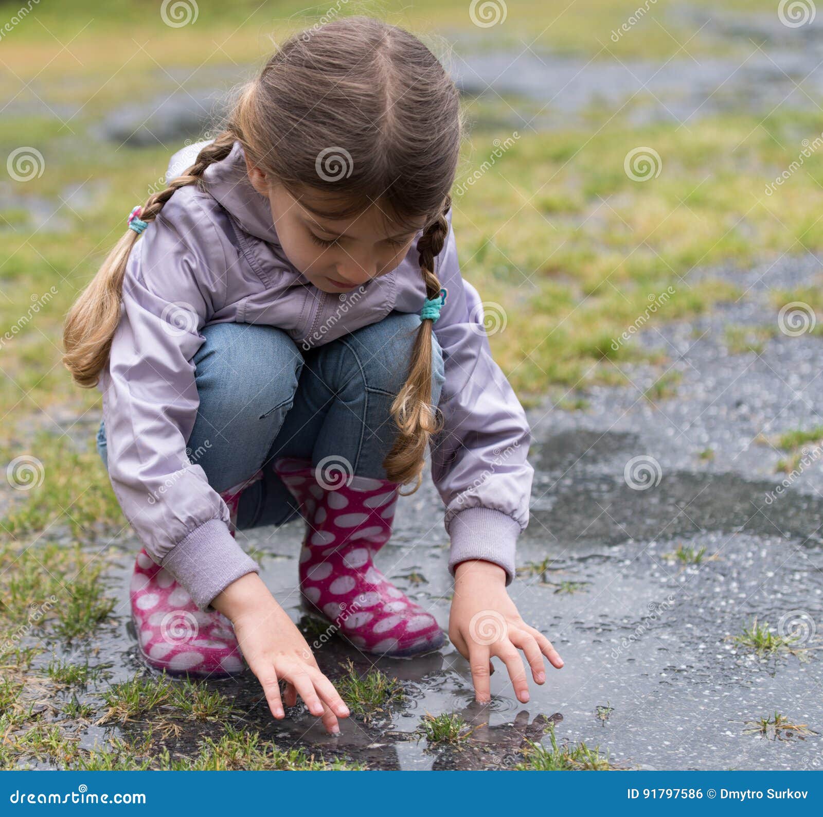 Little Girl Playing in the Rain Stock Photo - Image of little, dirt ...