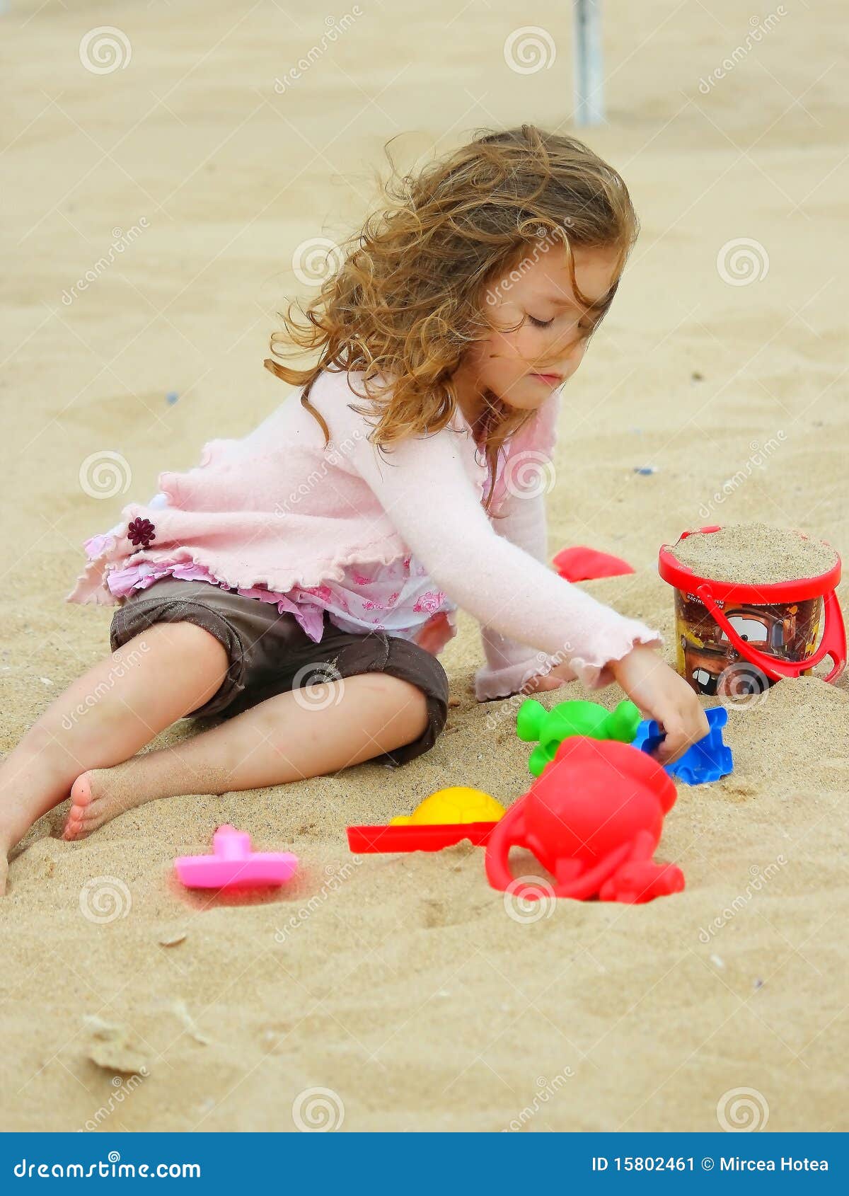 Little Girl Playing in the Sand Stock Image - Image of sprinkler ...