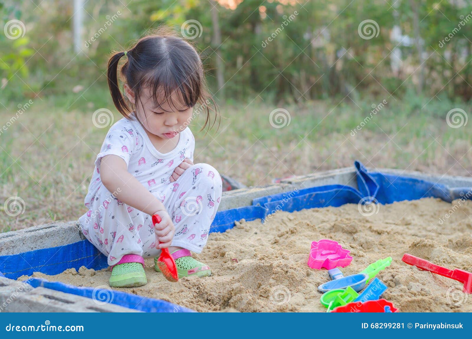 Little Girl Playing in Sandbox Stock Image - Image of active, little ...