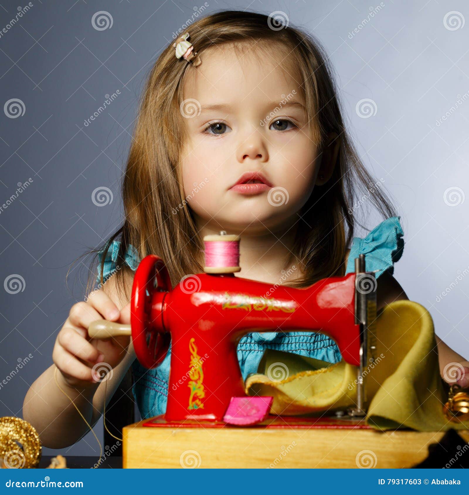 Little Girl is Playing with Sewing Machine Stock Image - Image of ...