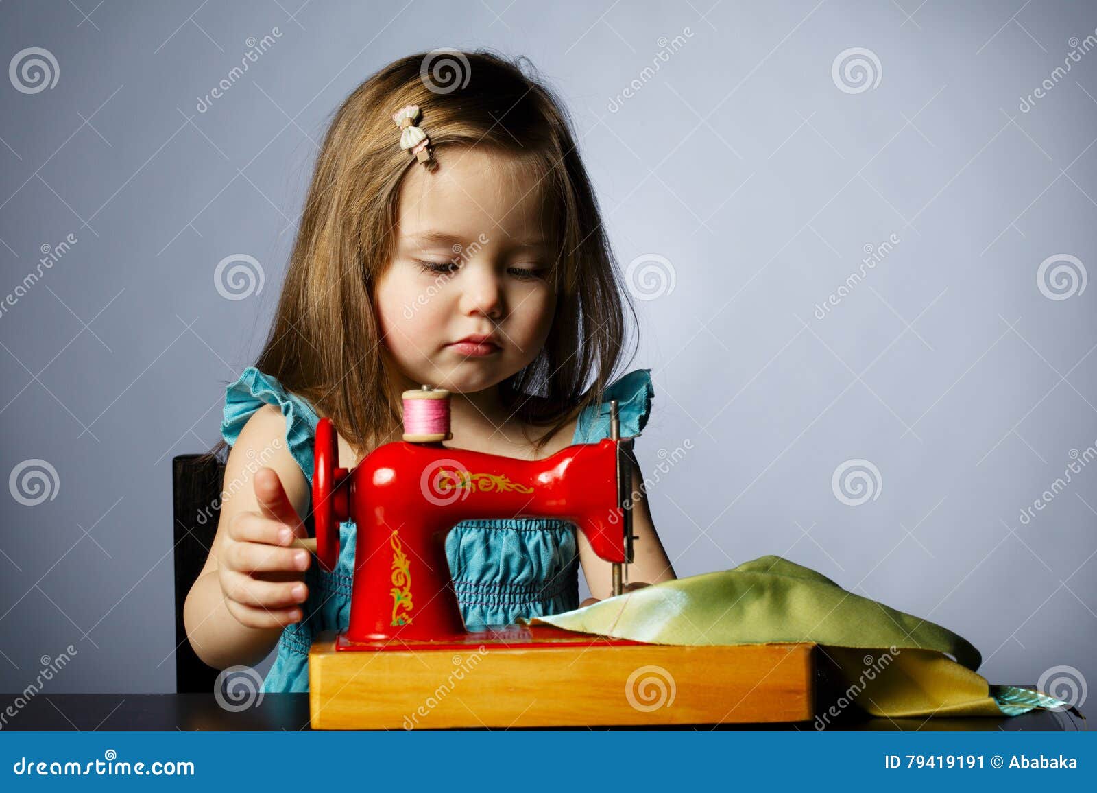 Little Girl is Playing with Sewing Machine Stock Image - Image of ...