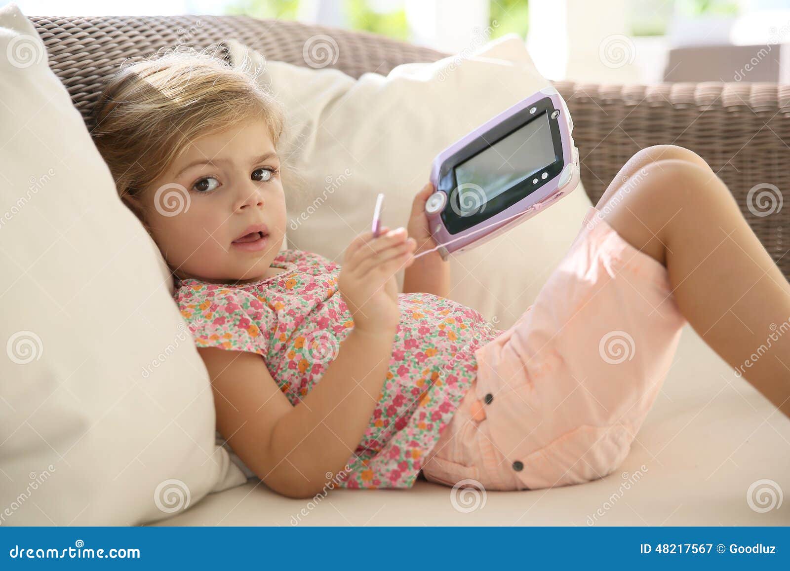 Little Girl Playing on a Tablet Stock Image - Image of technology ...
