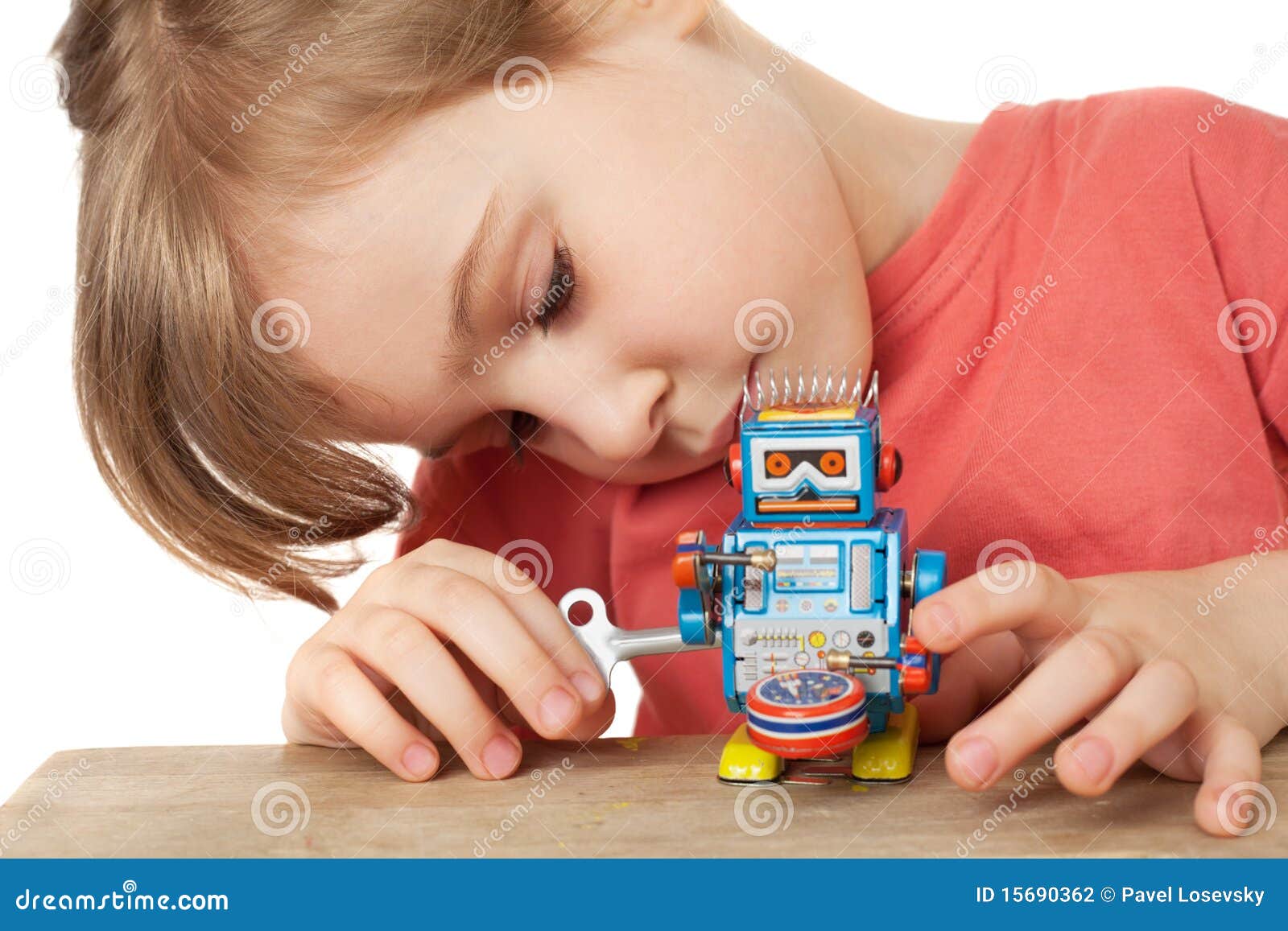 Little Girl Plays with Clockwork Robot Isolated Stock Photo - Image of ...