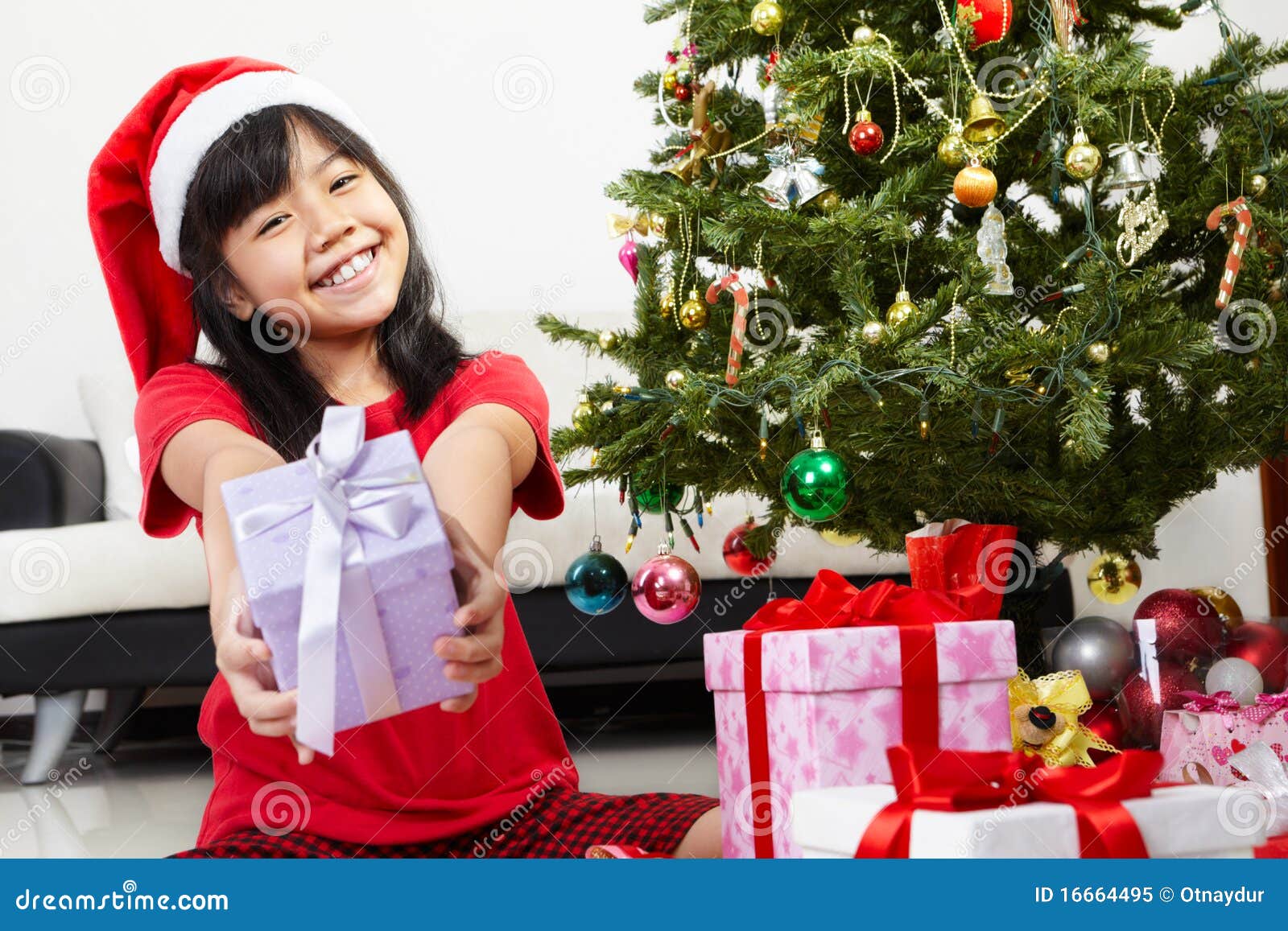 Little Girl Pointing Christmas Present Stock Image - Image of busy ...
