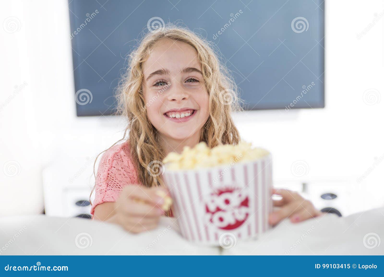 Little Girl with Popcorn in from of Tv Stock Image - Image of junk ...