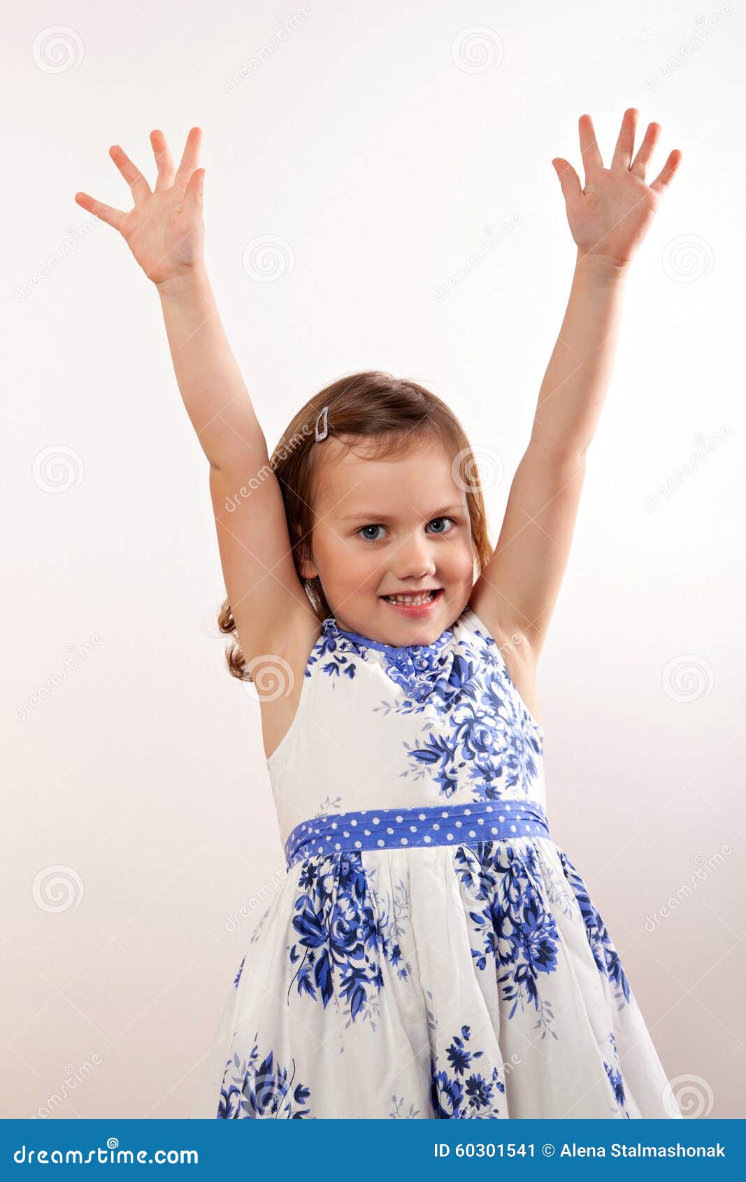 Little Girl Pulling Her Hands Up Stock Image - Image of hand, hair ...