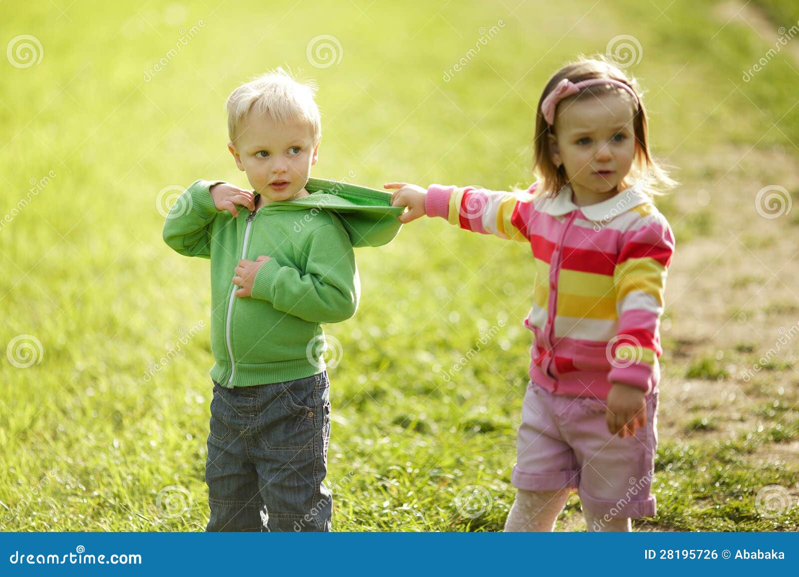 Little Girl Pulls the Boy S Hood Stock Photo - Image of kids, nature ...