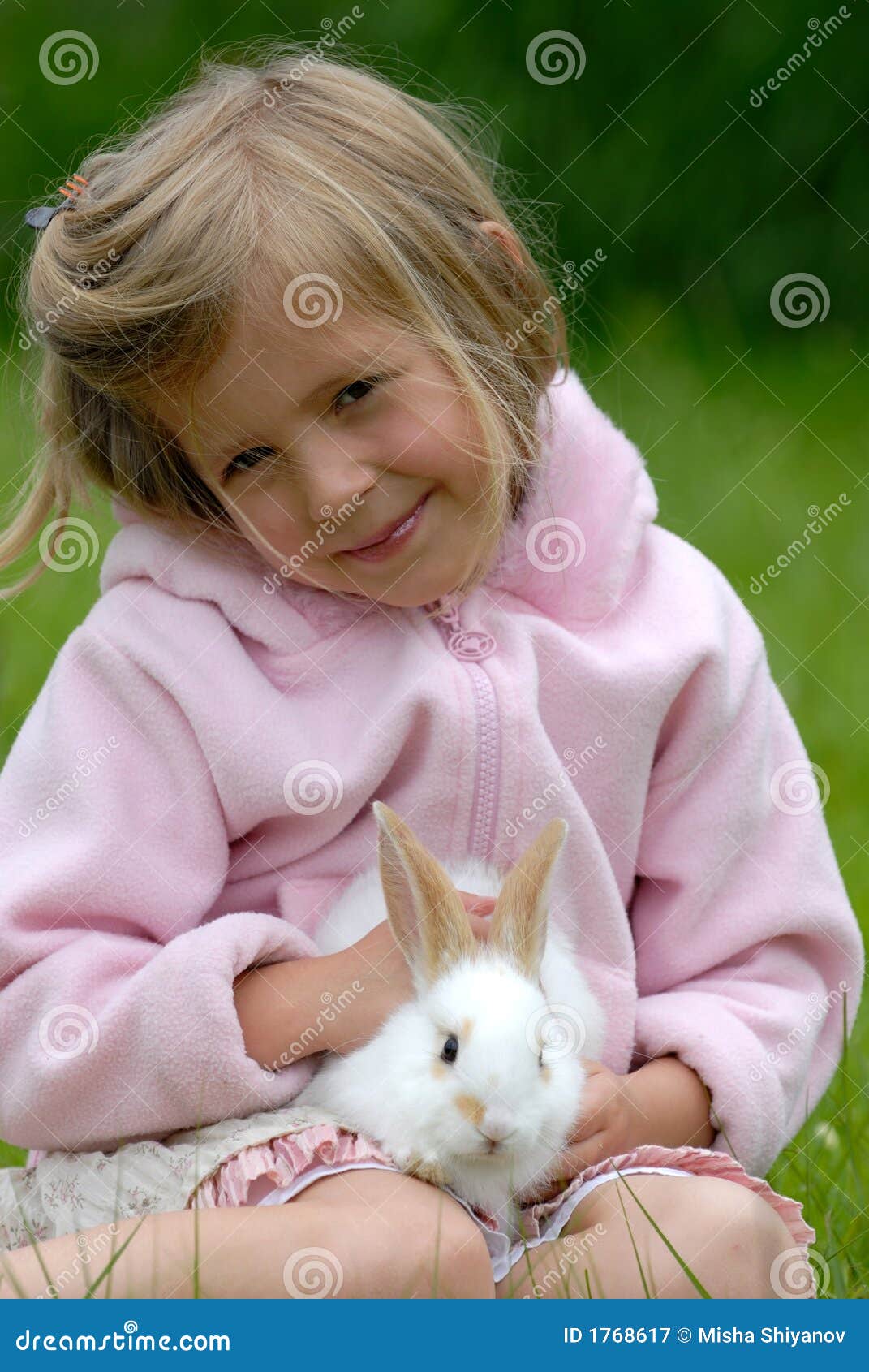 Little girl with a rabbit stock image. Image of cute, muzzle - 1768617