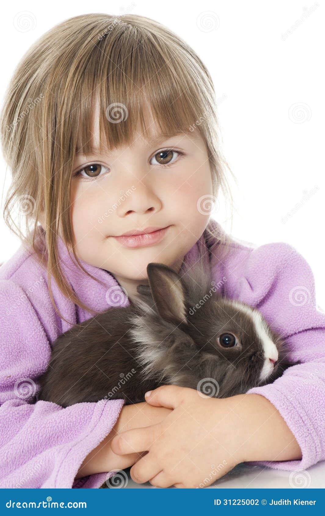 Little girl with rabbit stock photo. Image of care, lovely - 31225002