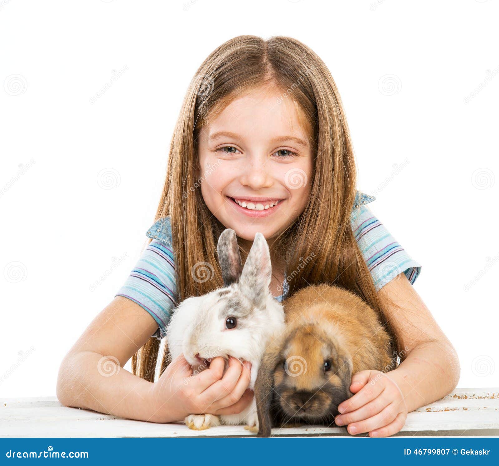 Little girl with rabbits stock image. Image of animal - 46799807