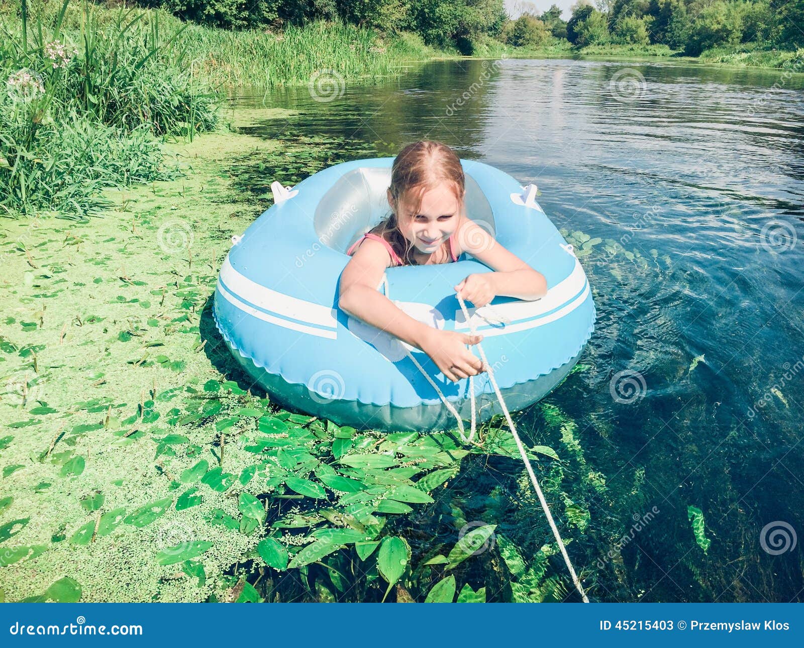 Little girl in a raft stock image. Image of little, raft - 45215403