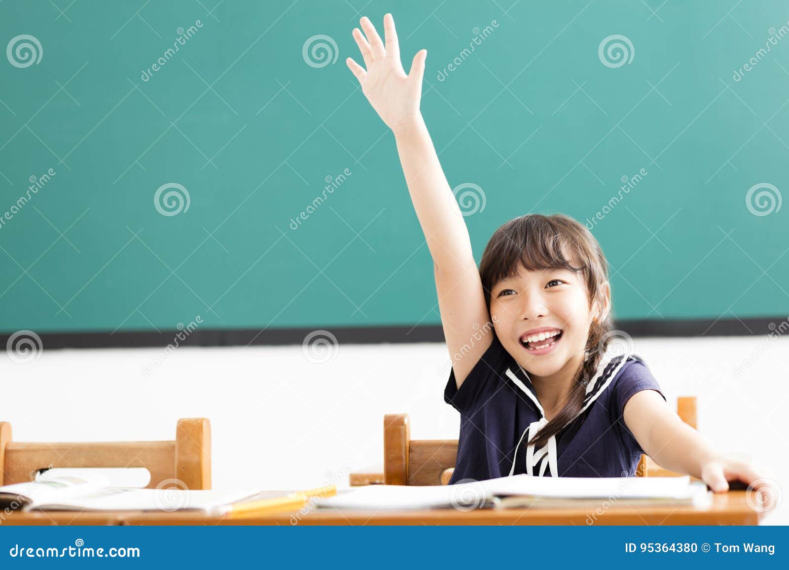 The Girl Raised Her Hand To Display A Meaningful Heart-shaped Symbol ...