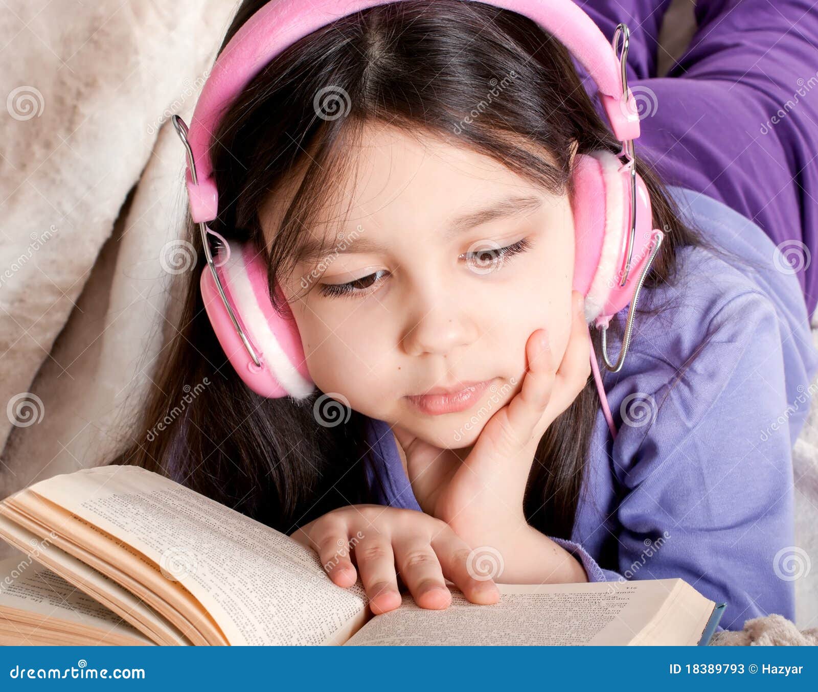 Little girl read a book stock image. Image of hobby, stereo - 18389793