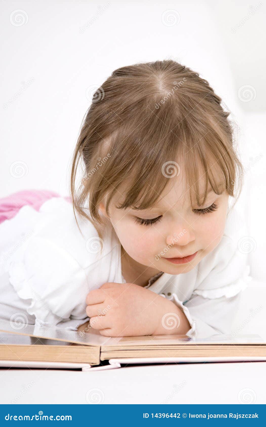 Little girl reading book stock photo. Image of pretty - 14396442