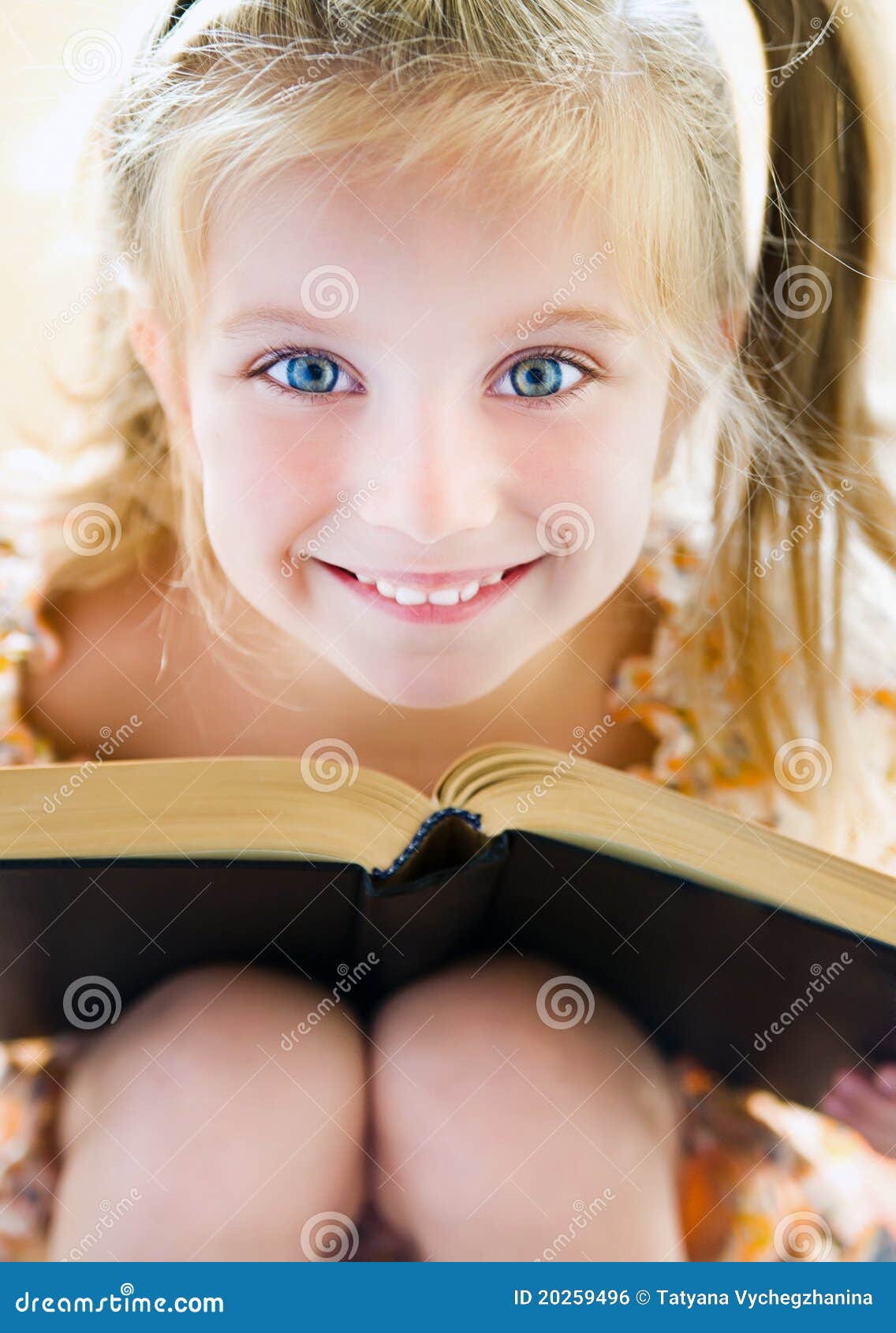 Little girl reading book stock photo. Image of people - 20259496