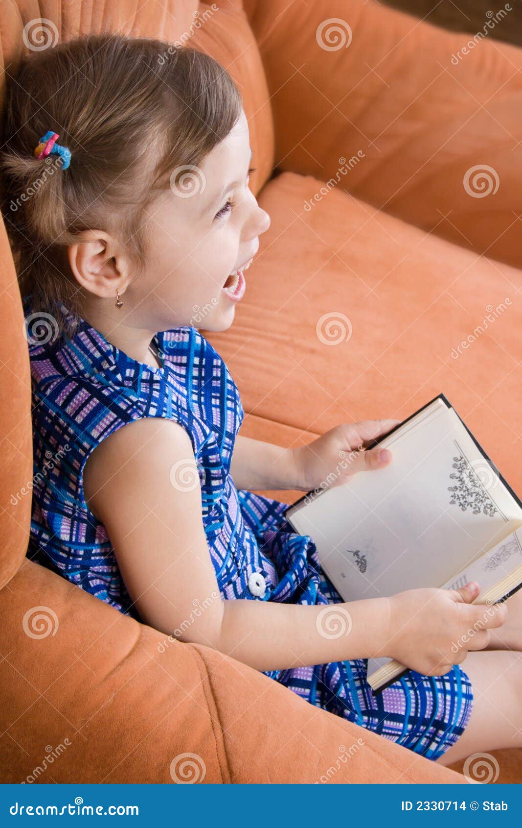Little girl reading book stock photo. Image of looking - 2330714