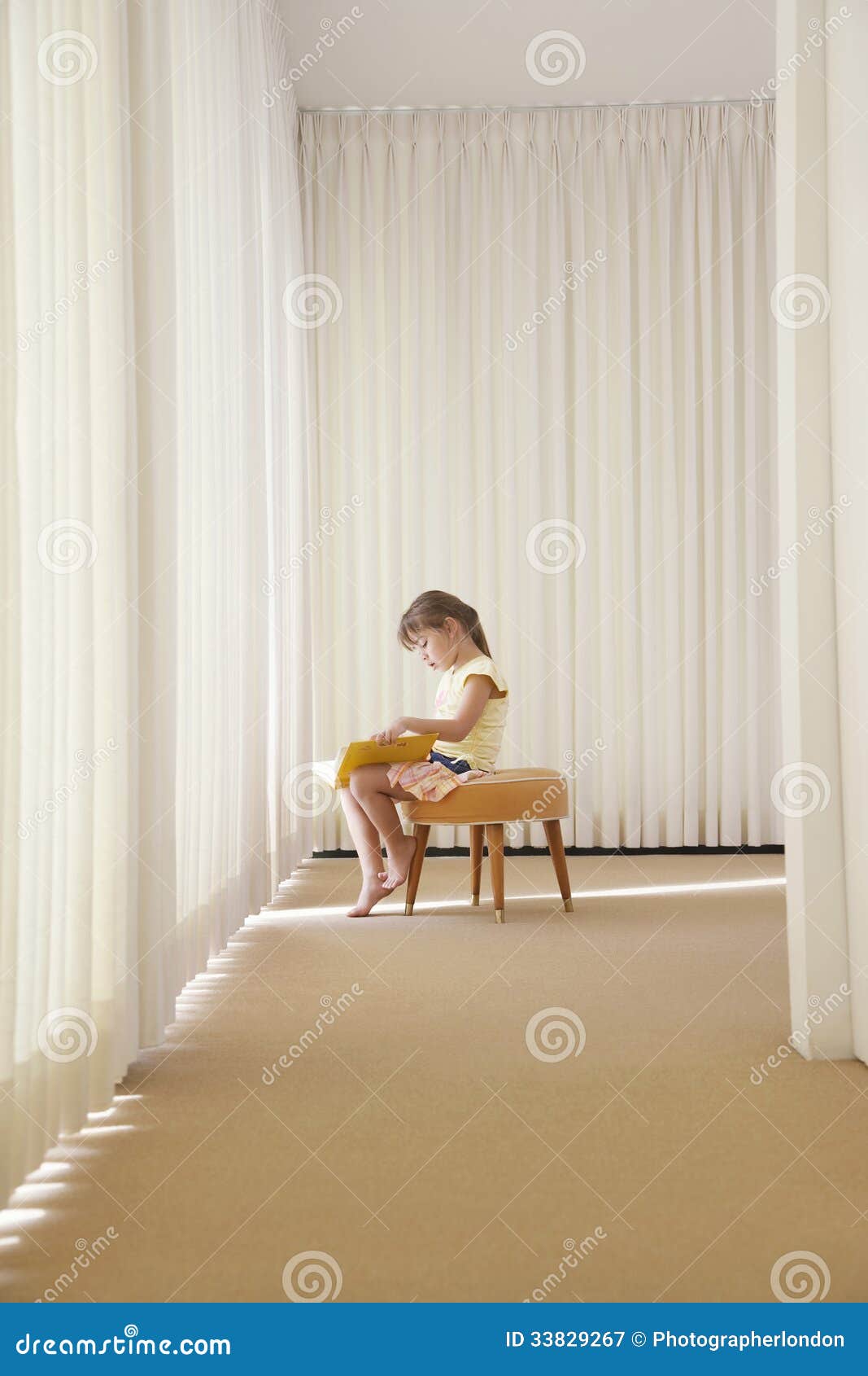 Little Girl Reading Book on Stool Stock Image - Image of curtain, mixed ...