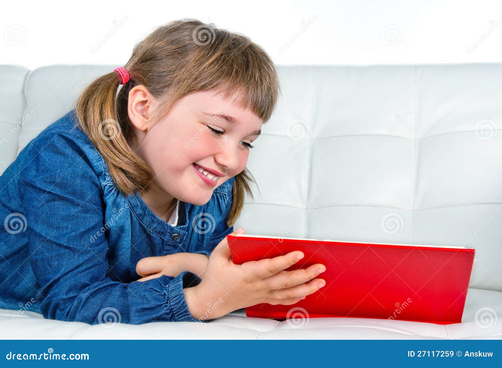 Little Girl Reading a Red Book Stock Image - Image of sofa, child: 27117259