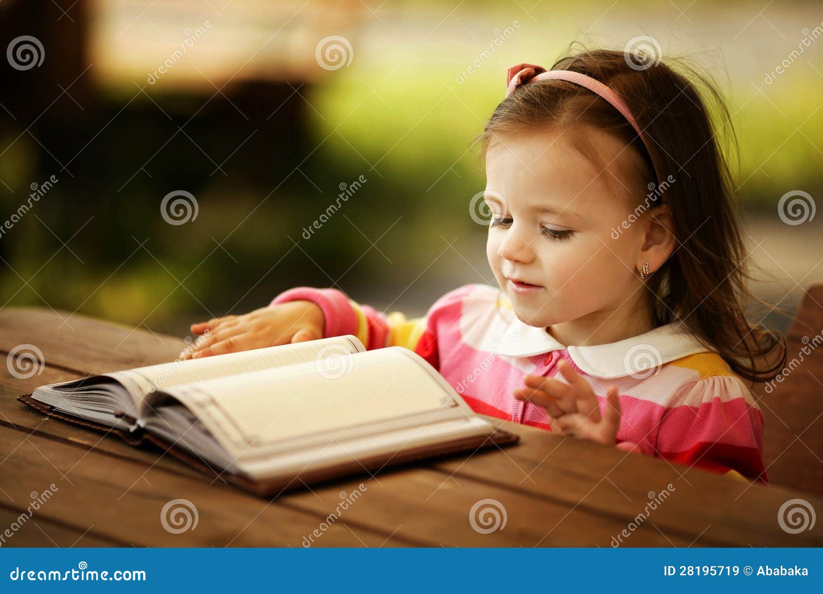 Little girl reads book stock image. Image of hair, life - 28195719