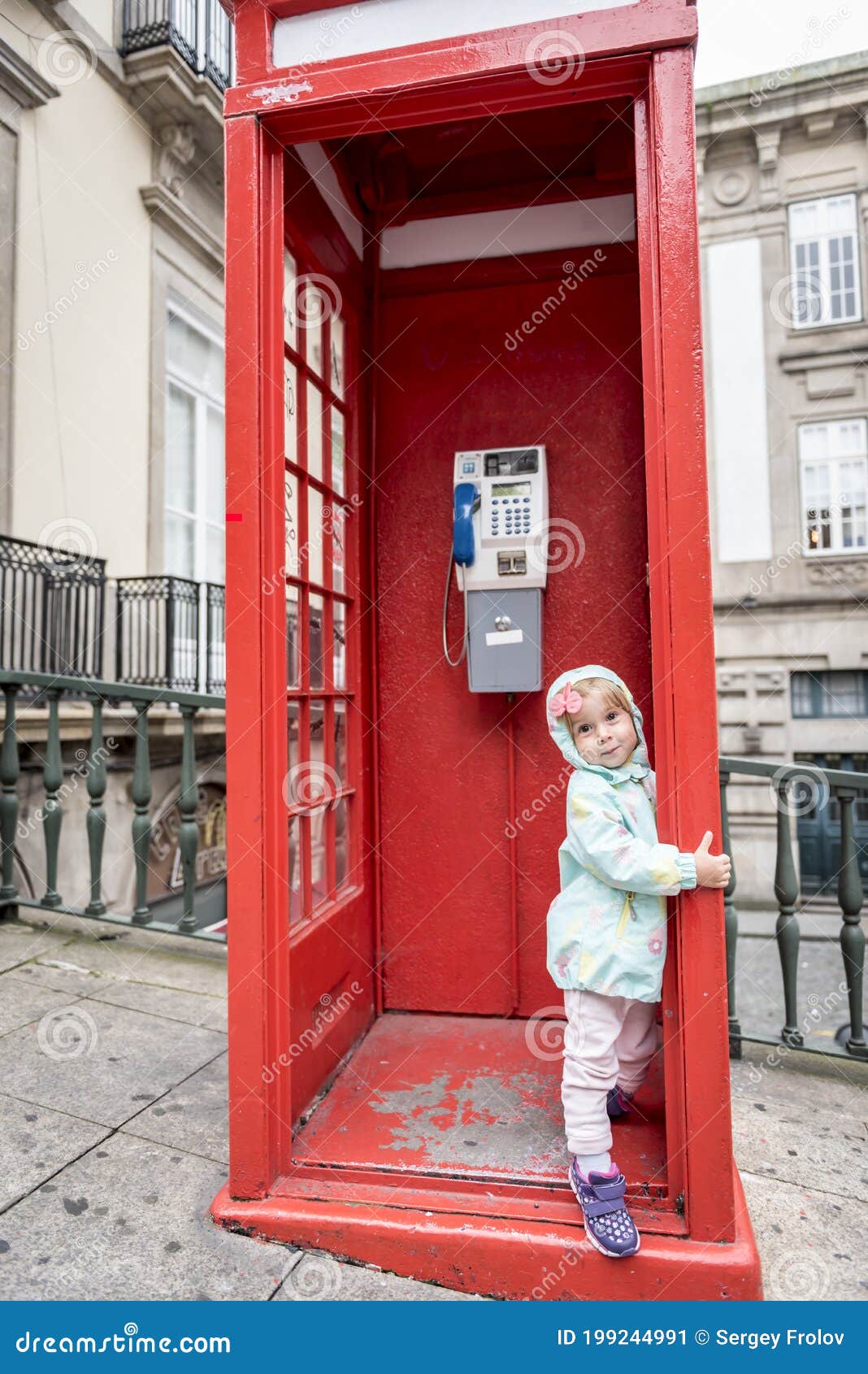 Little Girl in a Red Phone Booth Stock Image - Image of booth, little ...