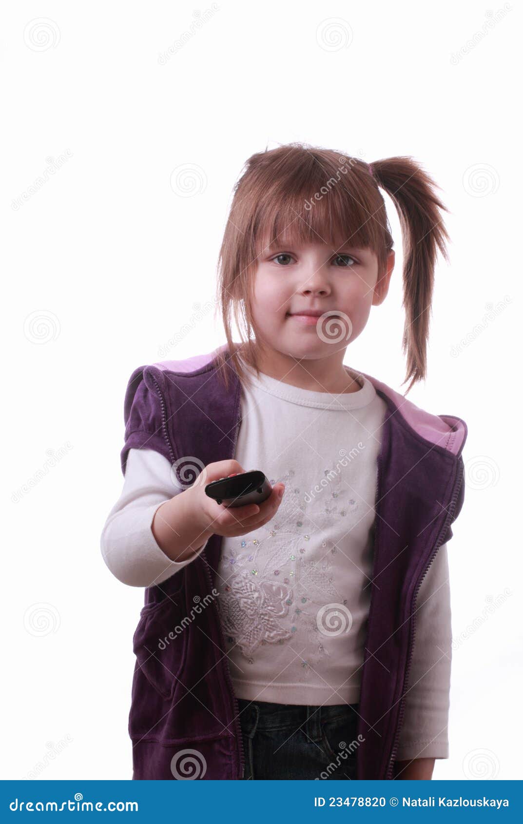 A Little Girl with a Remote Control Unit Stock Photo - Image of ...