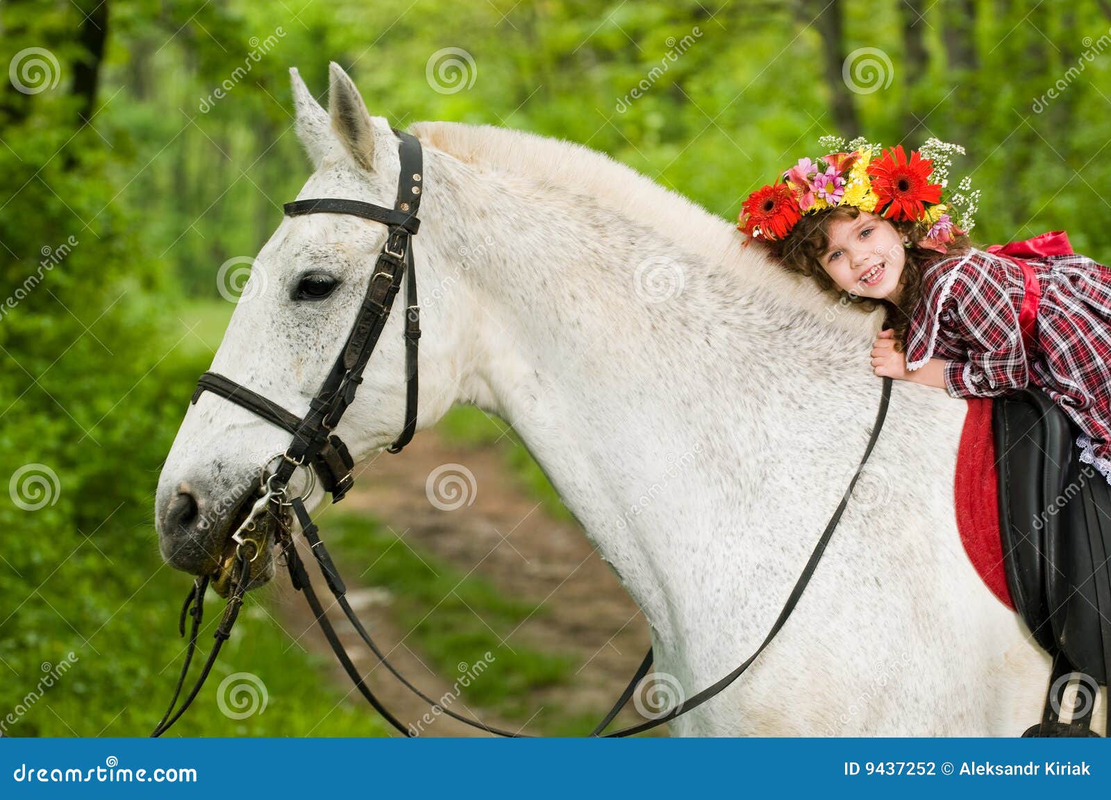 Little girl riding horse stock photo. Image of garland - 9437252