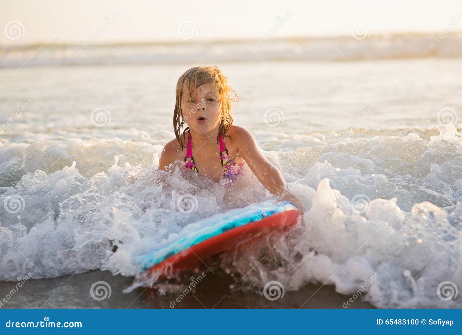Little Girl Riding Wave on Boogie Board Stock Photo - Image of sport ...