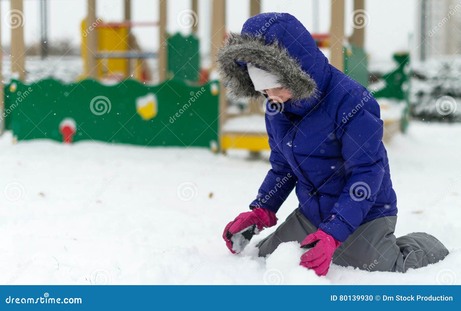 Little Girl Rolling Snowball. Stock Photo - Image of outdoor ...